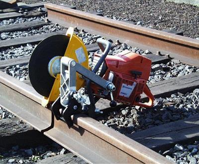 Rail cutting machines