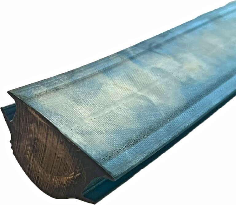 Rubber gap filler for rail flangeways